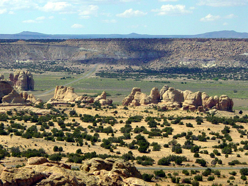 View of the road that leads to Acoma, and of surrounding mesas ...