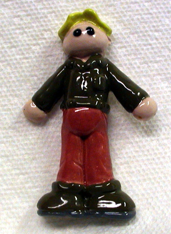Ceramic boy about four inches tall | Pics4Learning