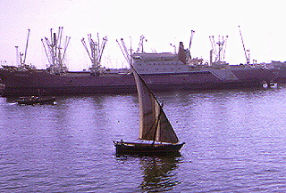 Sailboat and freighter | Pics4Learning