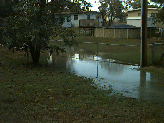 Flooded yard from rainstorm | Pics4Learning