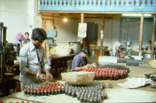 Promode bottle capping in India | Pics4Learning