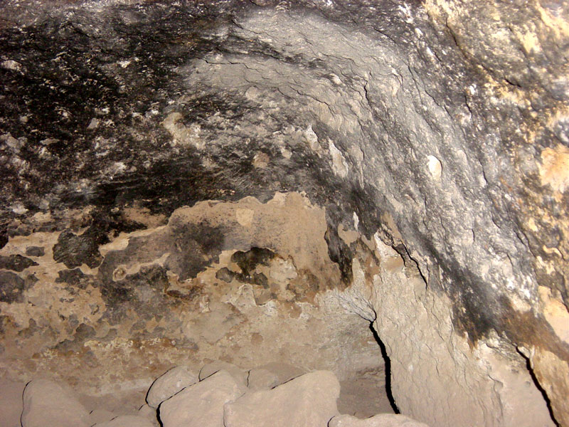 Black soot on the ceiling of the cave indicate use of fire for light ...